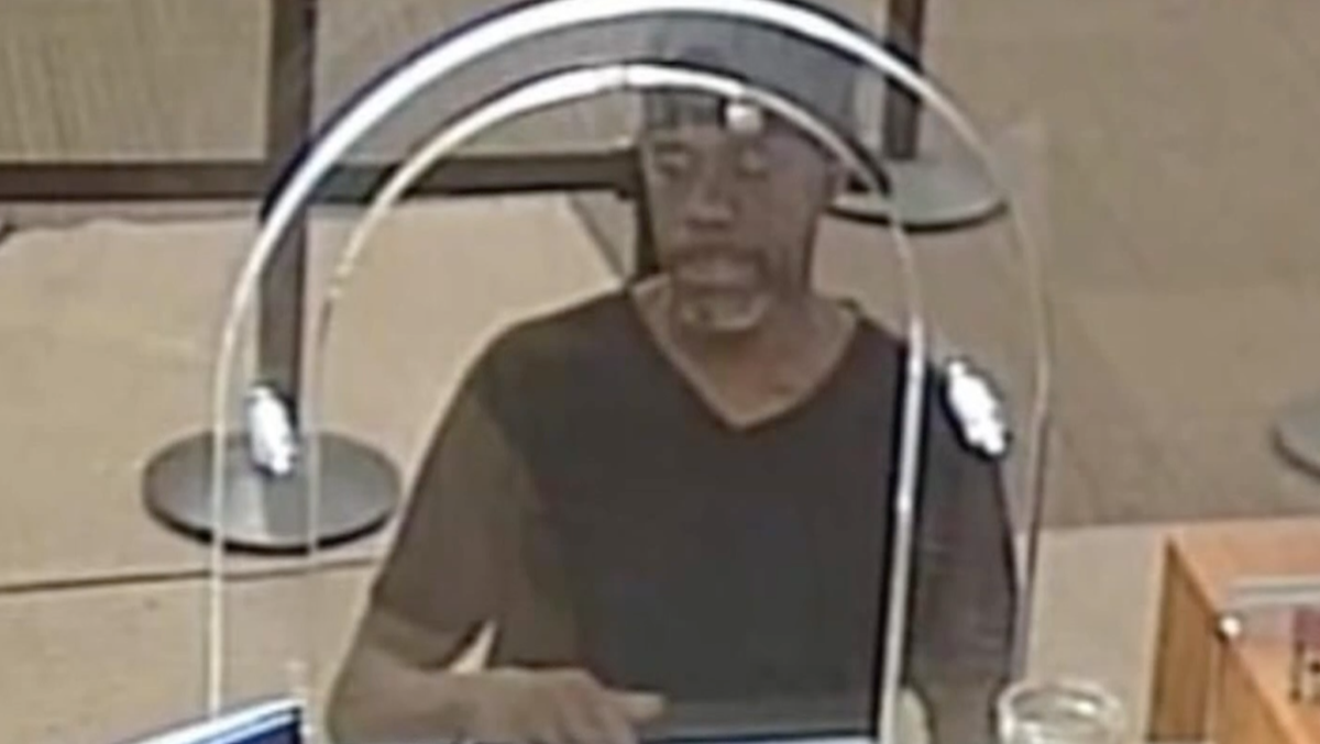 Suspect hands bank teller robbery note that included his name, address