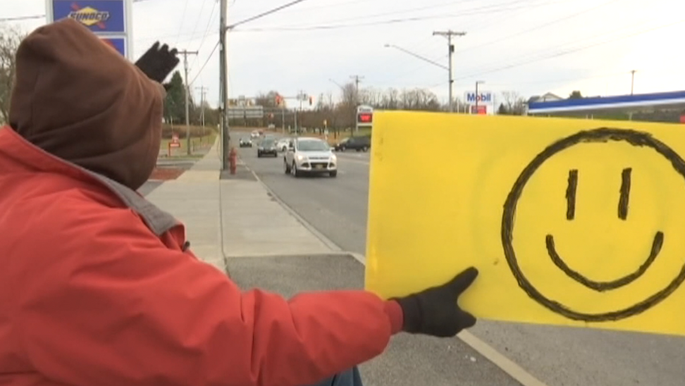 'Sometimes I don't want to go home': A man with a simple sign brings ...