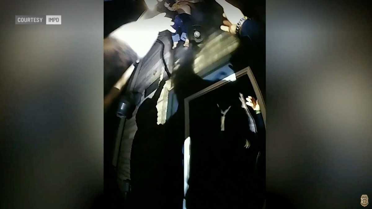 Watch Bodycam Shows Police Catch Toddlers Out Of Burning Building