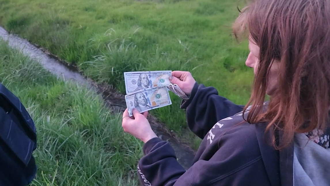 Video Man Throws Around 200k Of His Own Money Out Of Car On Interstate