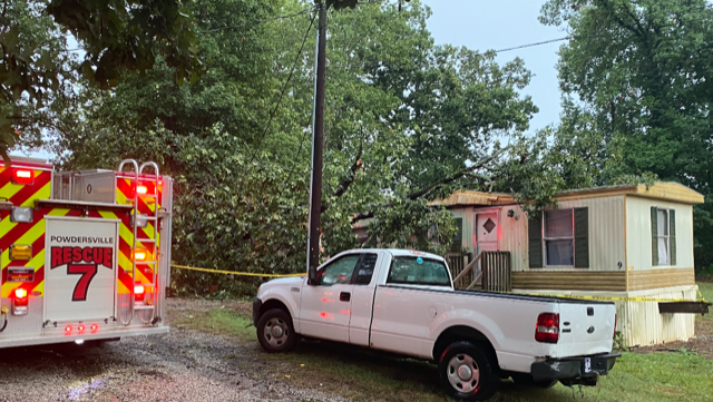 Fire officials respond to a tree that fell on an Upstate home