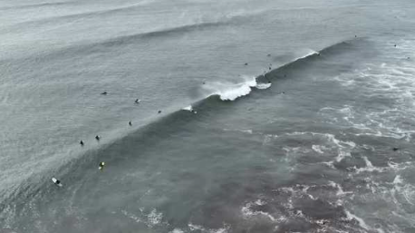 Surfers take advantage of big waves ahead of Hurricane Lee