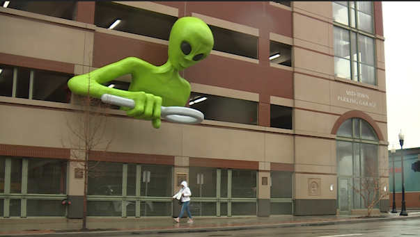 Alien invasion: Why is there a giant alien hovering over the streets of ...