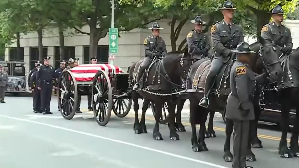 Photos from the memorial service for fallen hero officer Joshua Eyer