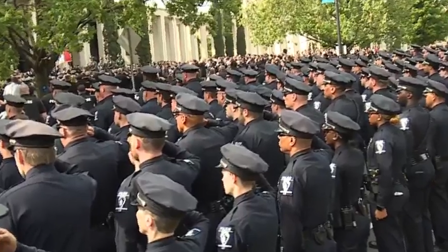 Photos from the memorial service for fallen hero officer Joshua Eyer
