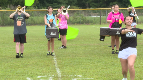 Music fills Locust Fork as Emerald Night Band prepares for halftime ...