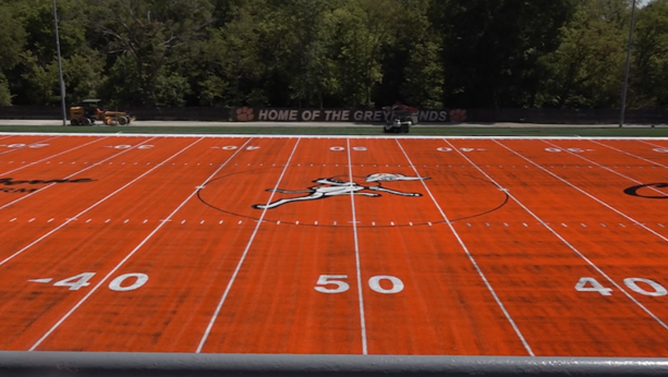 Kentucky high school goes viral for its bright orange football field