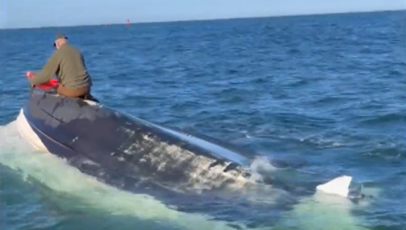 Two fishermen rescue man on overturned boat off the coast of Cape Cod