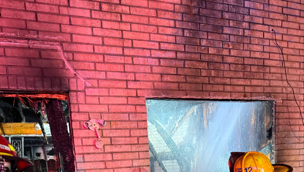 Two-story townhouse goes up in flames