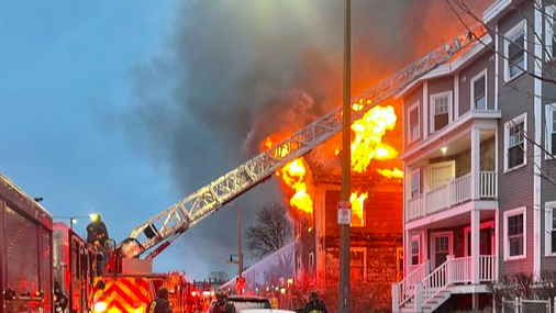 Firefighters investigate large fire at abandoned building in Boston