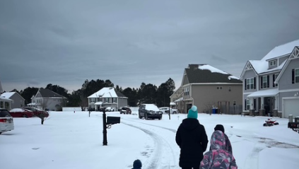 PHOTOS | Snow fun at the beach in North Carolina
