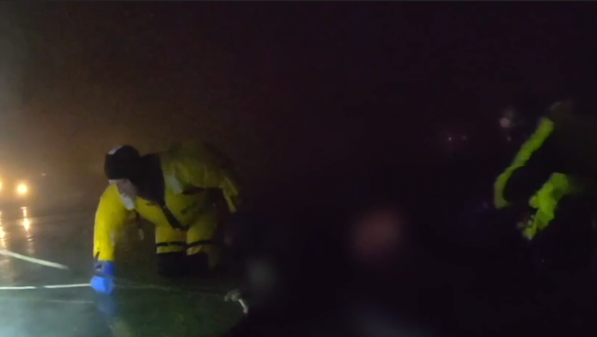 Police officer saves woman from icy lake in Ohio