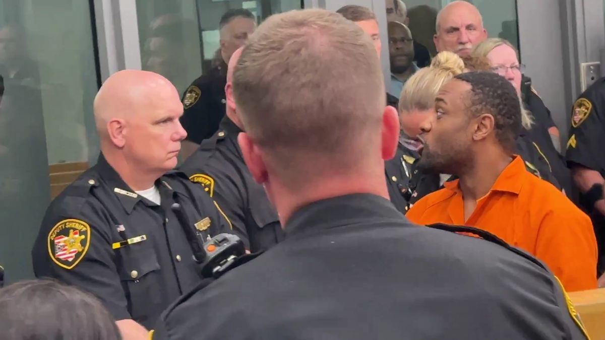 PHOTOS: Officers pack courtroom at arraignment of man accused of ...
