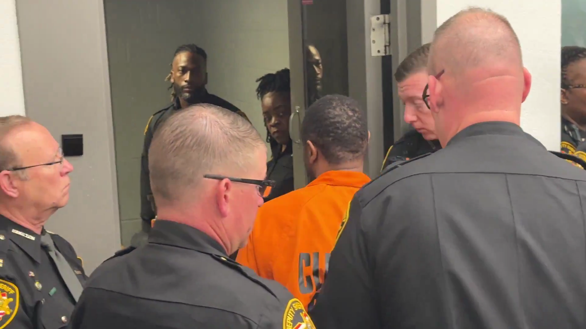 PHOTOS: Officers pack courtroom at arraignment of man accused of ...