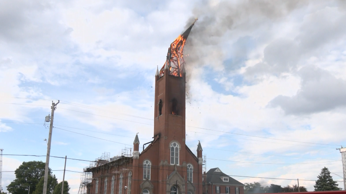 Spire collapses as historic Ohio church burns in fire