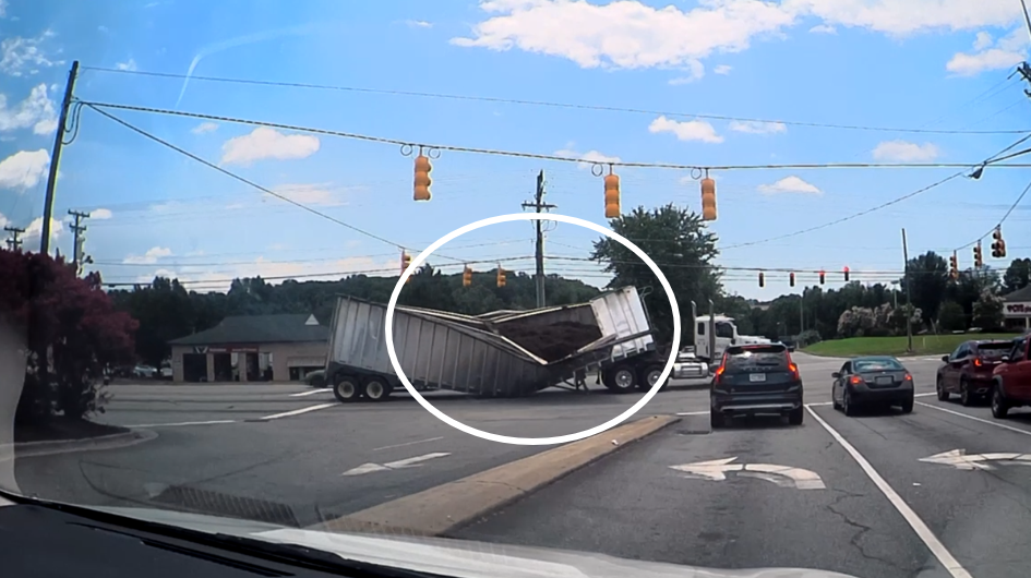 Tractor-trailer falls apart while traveling through intersection in ...