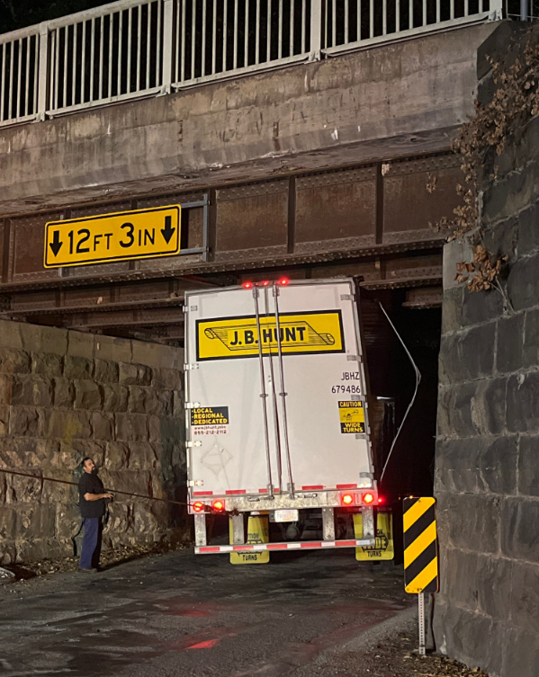 Tractor-trailer gets stuck under York County, Pa. railroad bridge