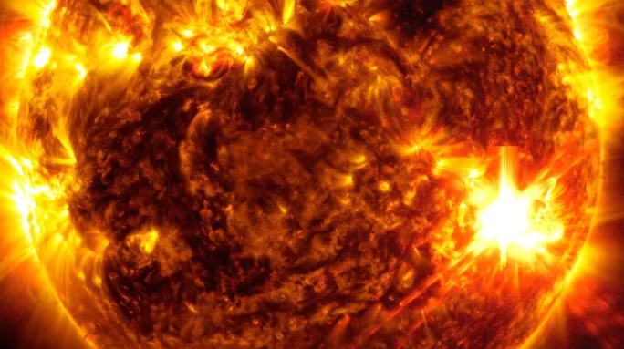 What are solar flares and can they be seen from Earth?