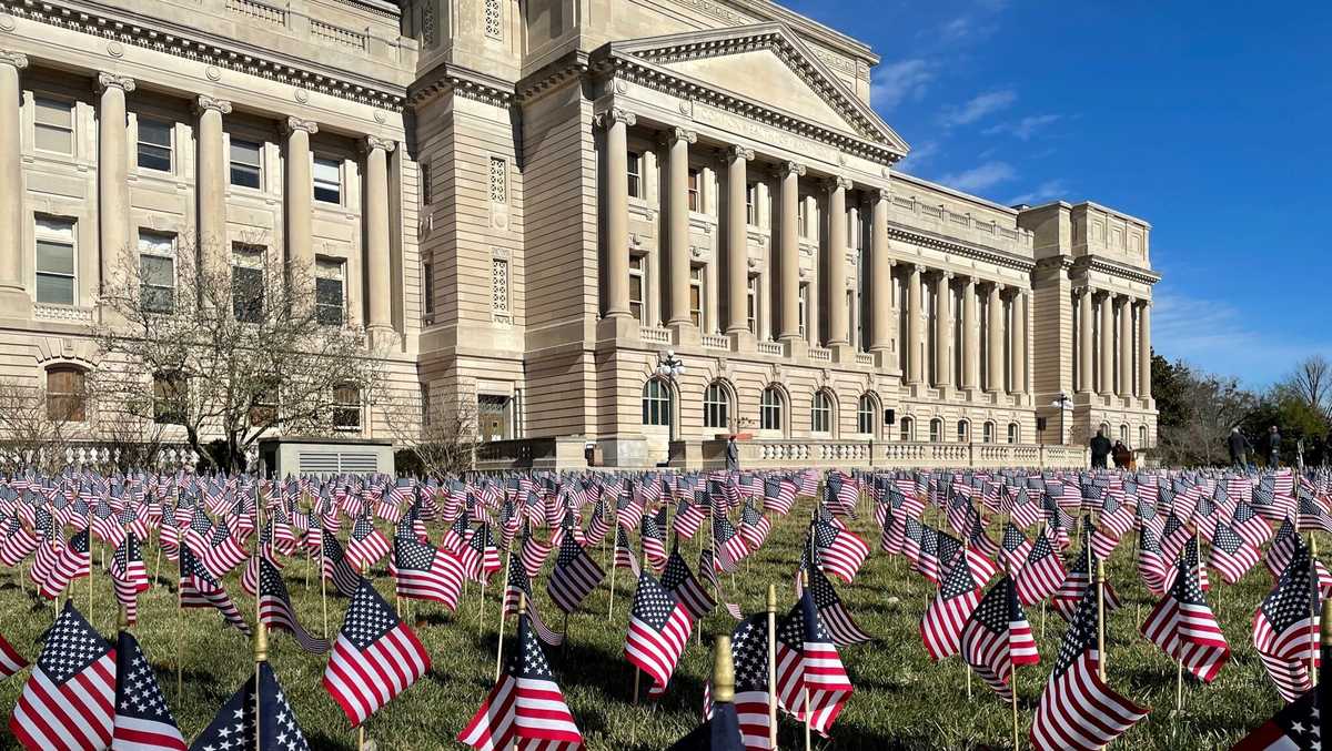 Gov. Beshear honors COVID victims during flag planting ceremony