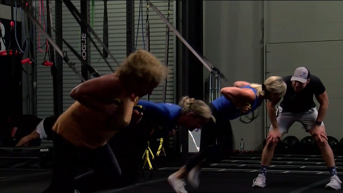 Trainer motivates others through childhood bullying experience