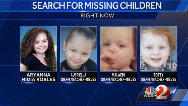 Mother surrenders 4 missing children to authorities, officials say