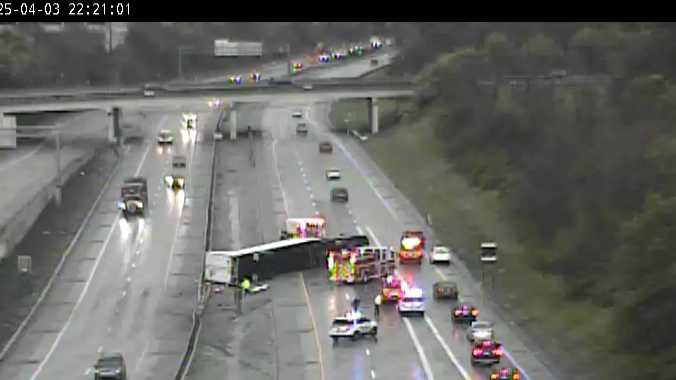 Overturned semi blocking all lanes of I-64 W