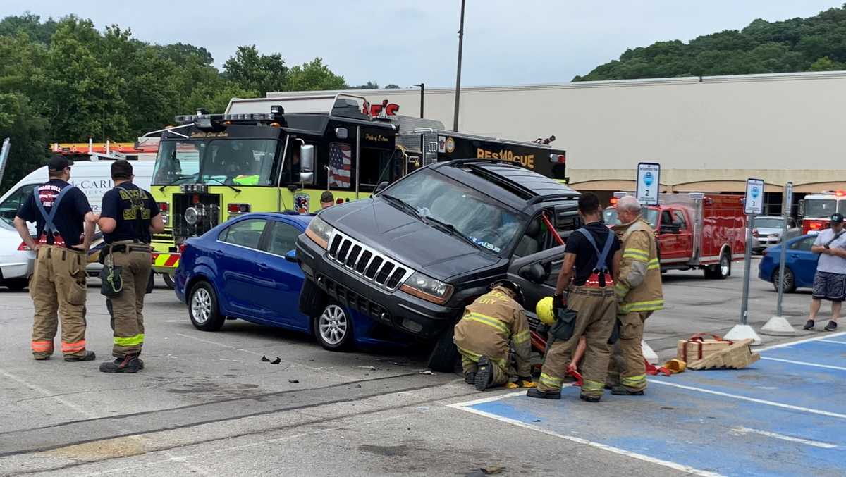 Car lands on top of vehicle after crash in Shaler parking lot