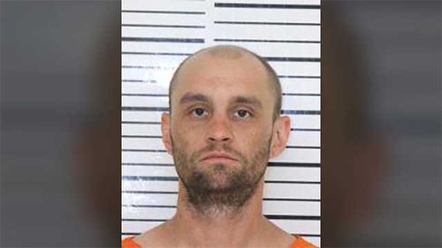 Iowa man charged with murder months after his wife found dead