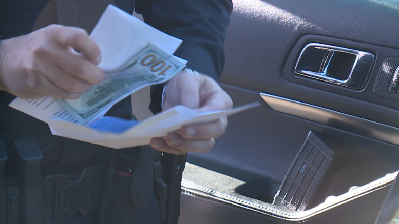 Shawnee Police hand out hundreds of dollars thanks to Secret Santa