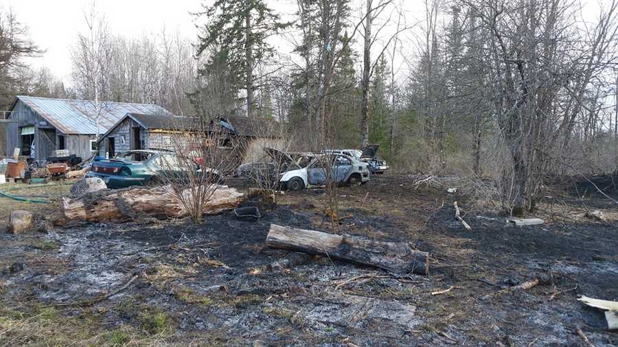 Firefighters battle dozens of wildfires as Maine conditions improve