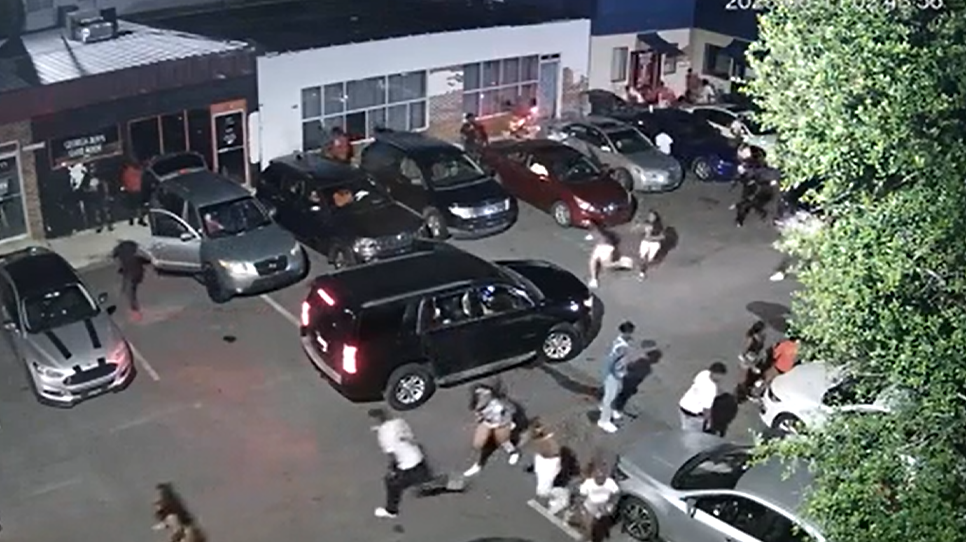 Georgia: Video shows crowd running for cover after gunshots