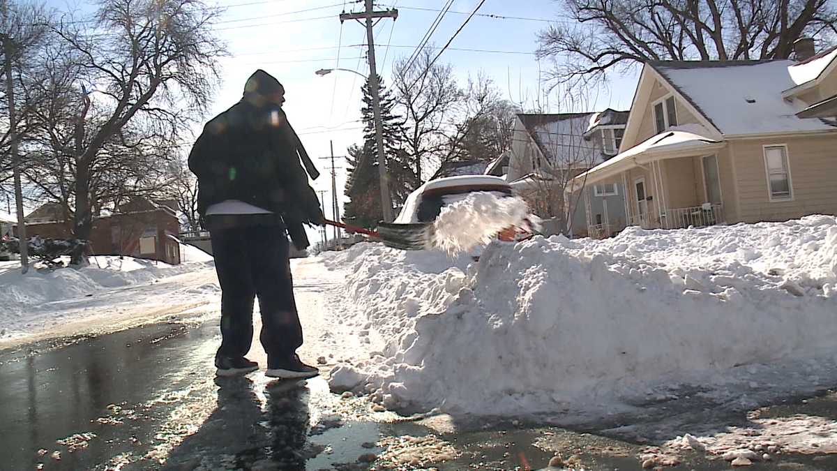 'The car is completely surrounded with snow': People dig out from big ...