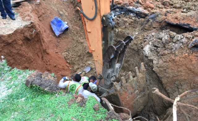Images: Jackson city worker injured when he falls in sinkhole