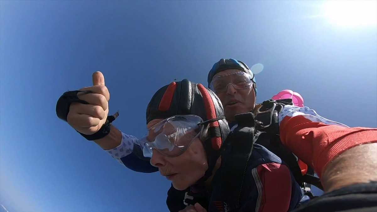 Seattle woman breaks world record for oldest tandem skydiver