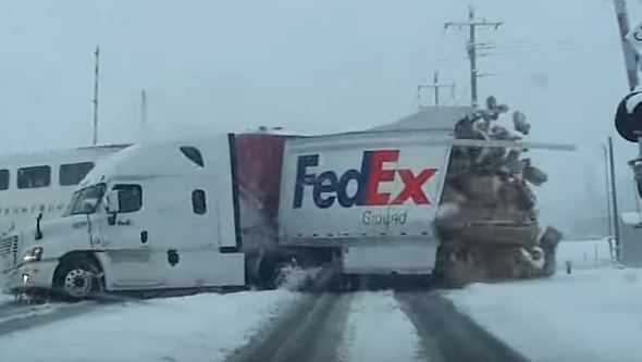 WATCH: Commuter train slams FedEx truck in Utah