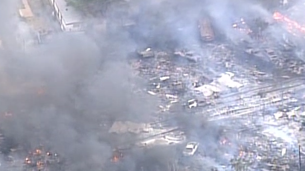 Crews battle large structure fire near Socorro