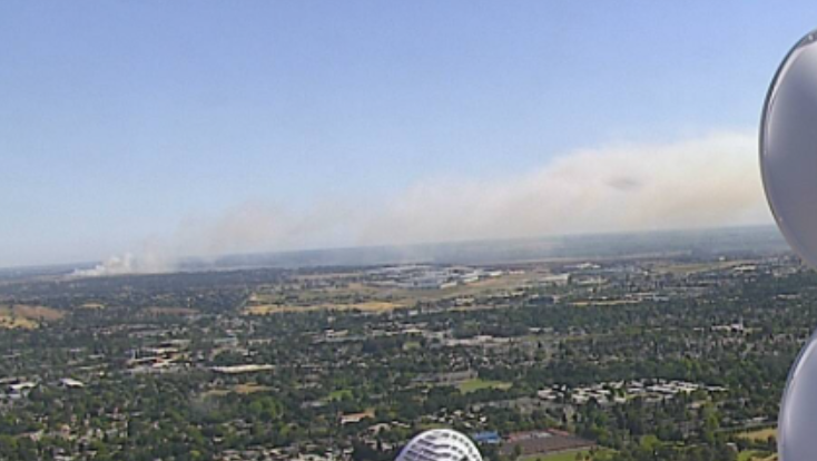 Crews battle vegetation fire near Winters