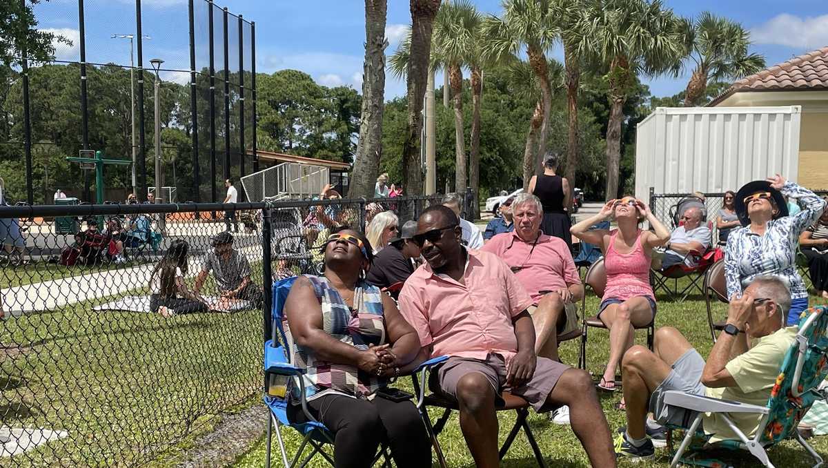 Dozens of families check out solar eclipse at Palm Beach Gardens watch ...