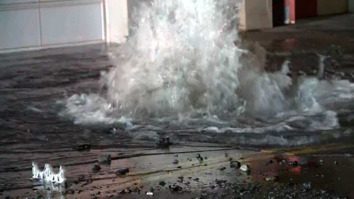 Broken fire pipe leaves huge crater in middle of Boston street