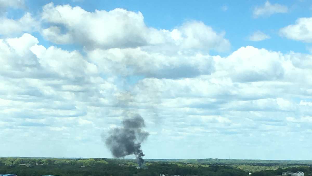 Crews battle fire at South Portland home