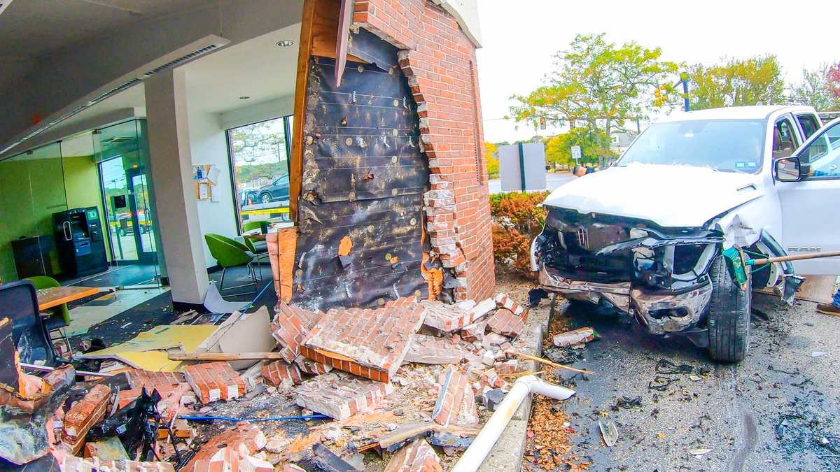 Truck goes airborne before slamming into bank