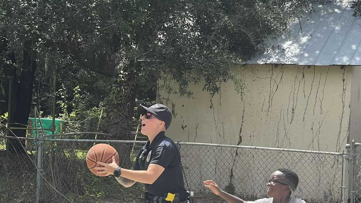 PHOTOS: Savannah police officer, boy have basketball showdown