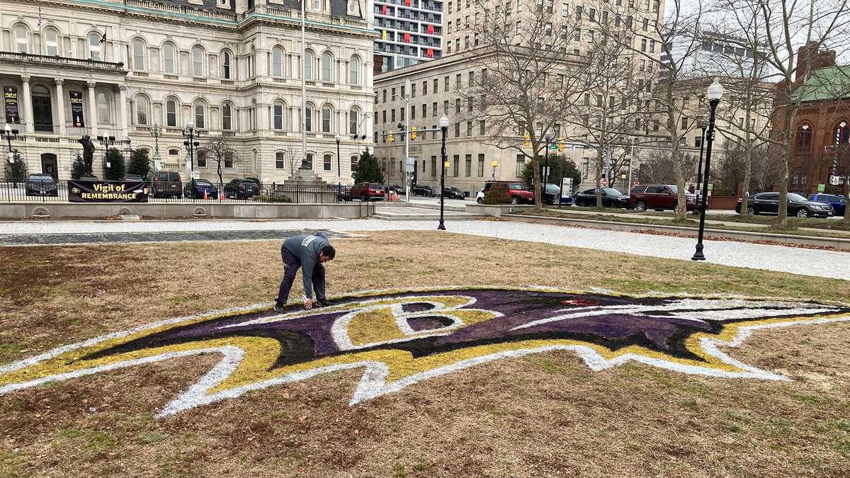 Ravens stencil team logo across Baltimore ahead of playoffs