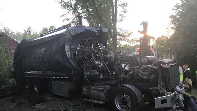 Man dead after garbage truck crash in Stoneham