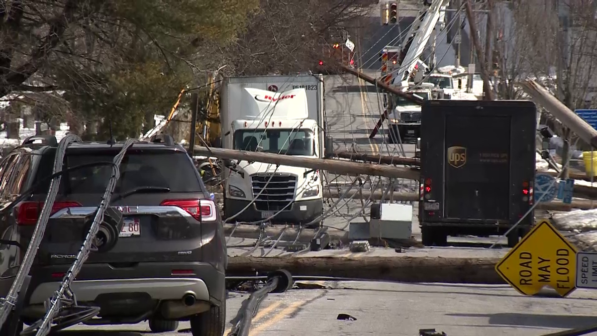 Truck snags wire, 7 poles topple like dominoes