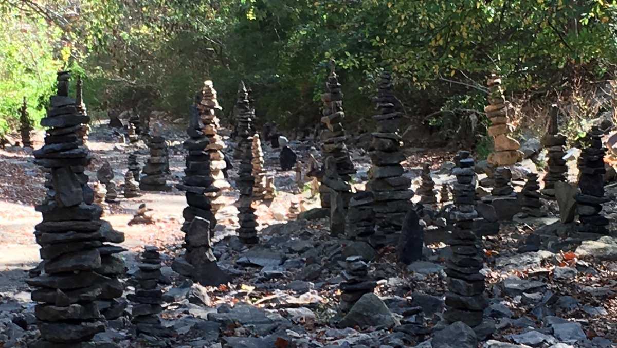 Dozens of stone towers built in dry Patton Creek