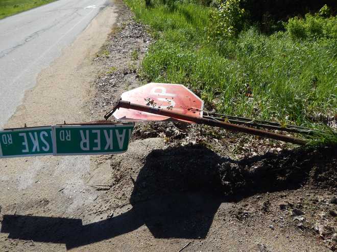 Police search for pickup truck driver knocking down stop signs