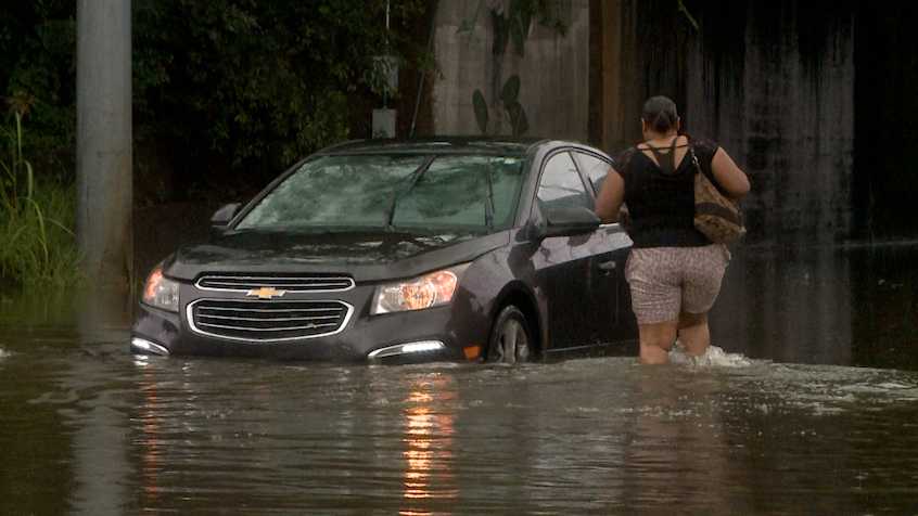 'The water went all the way over the whole car,' stranded driver says