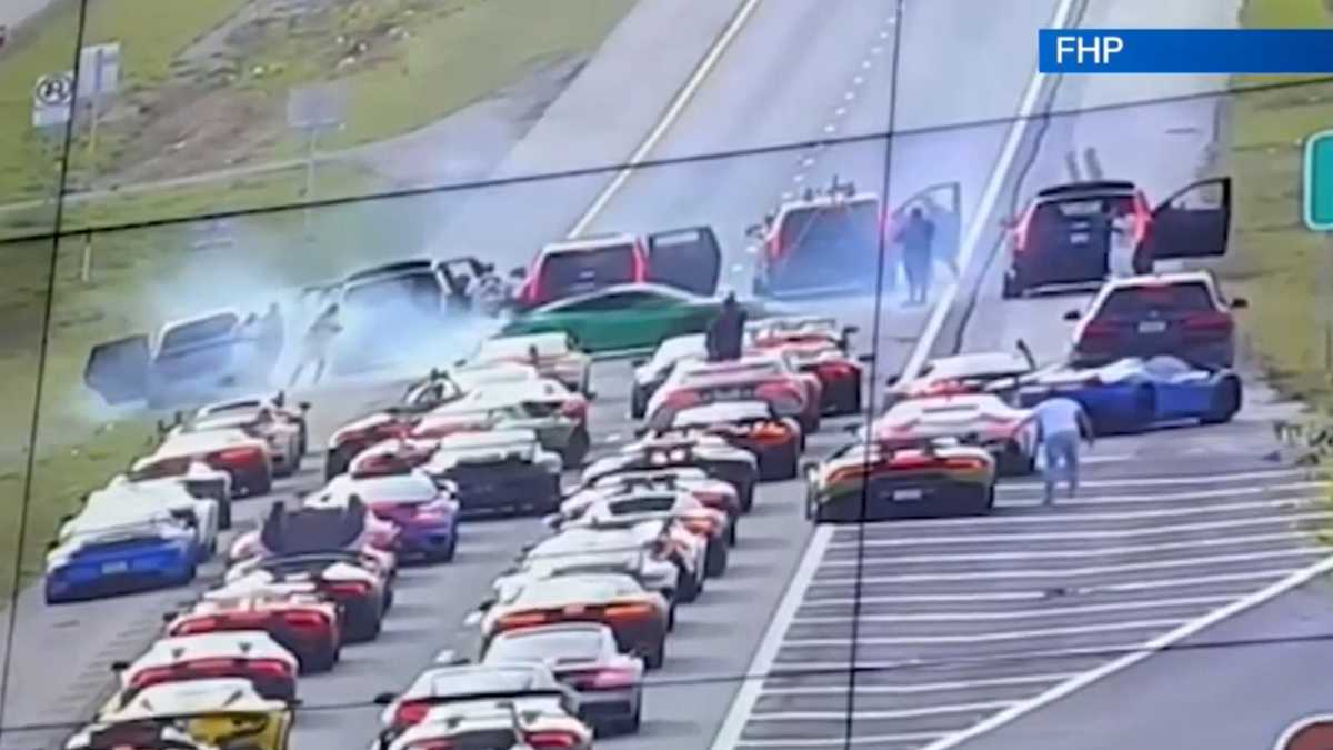 25 exotic cars street race, block Florida's Alligator Alley