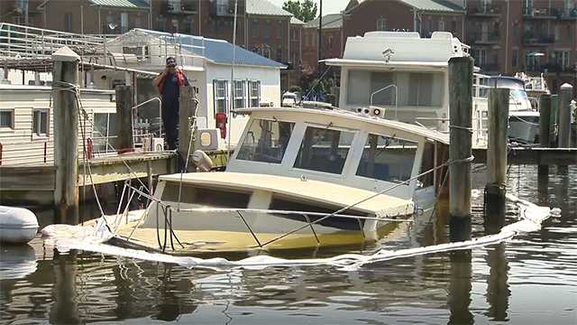 Police investigate sinking of 2 boats at Baltimore marina